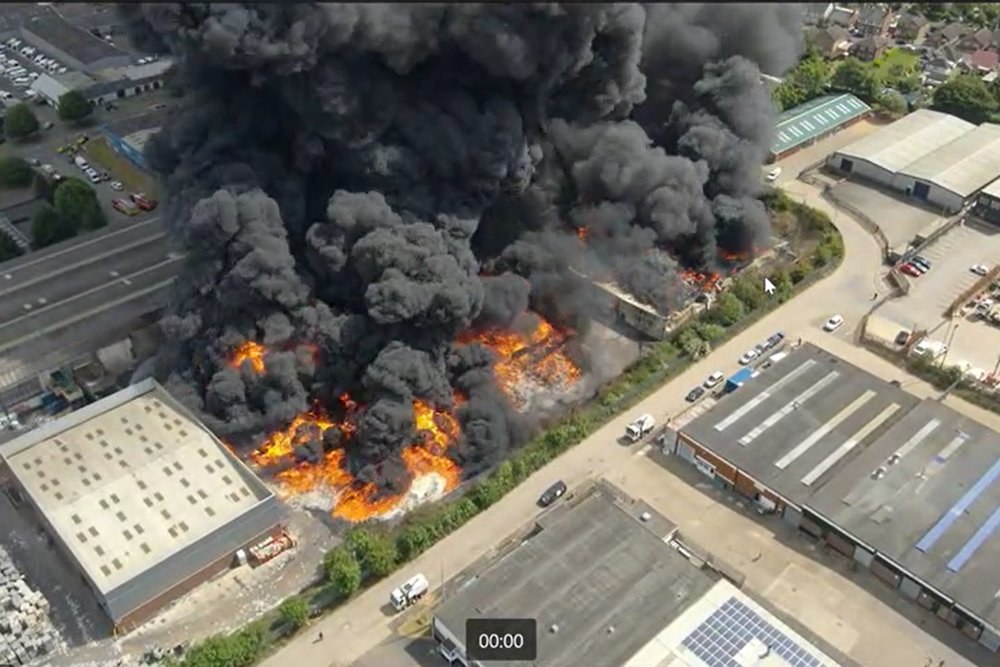 Major incident declared as firefighters battle huge warehouse blaze in ...