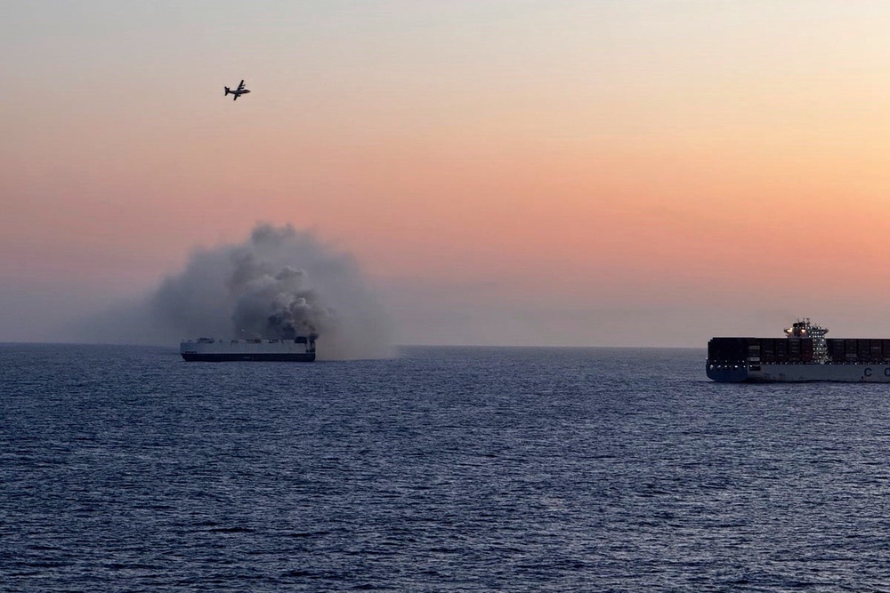 What led to a car carrier sinking in the North Pacific Ocean