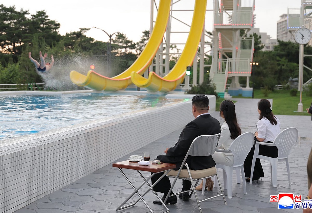 Kim Jong Un watches swimmers use waterslide as North Korea opens huge ...