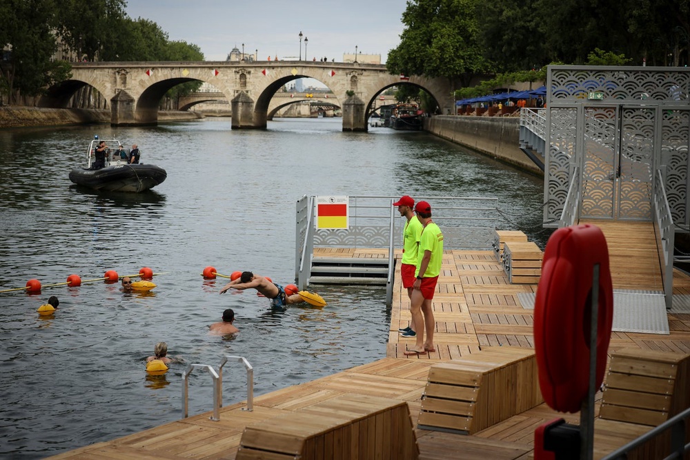 Swimmers plunge into the river Seine after 100-year ban lifts