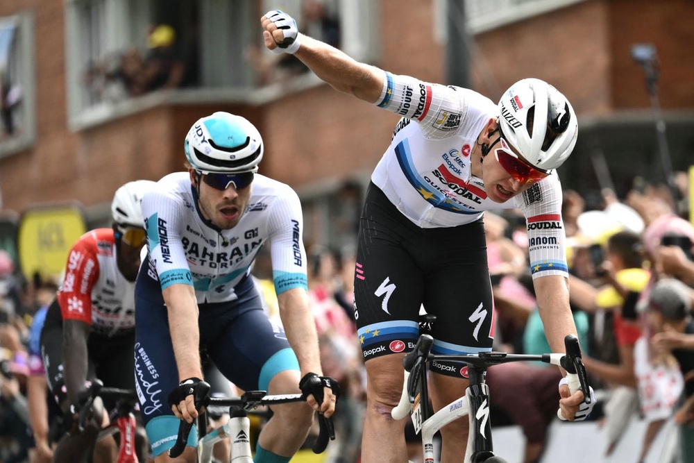 Tim Merlier takes sprint victory after Jasper Philipsen abandons as ...