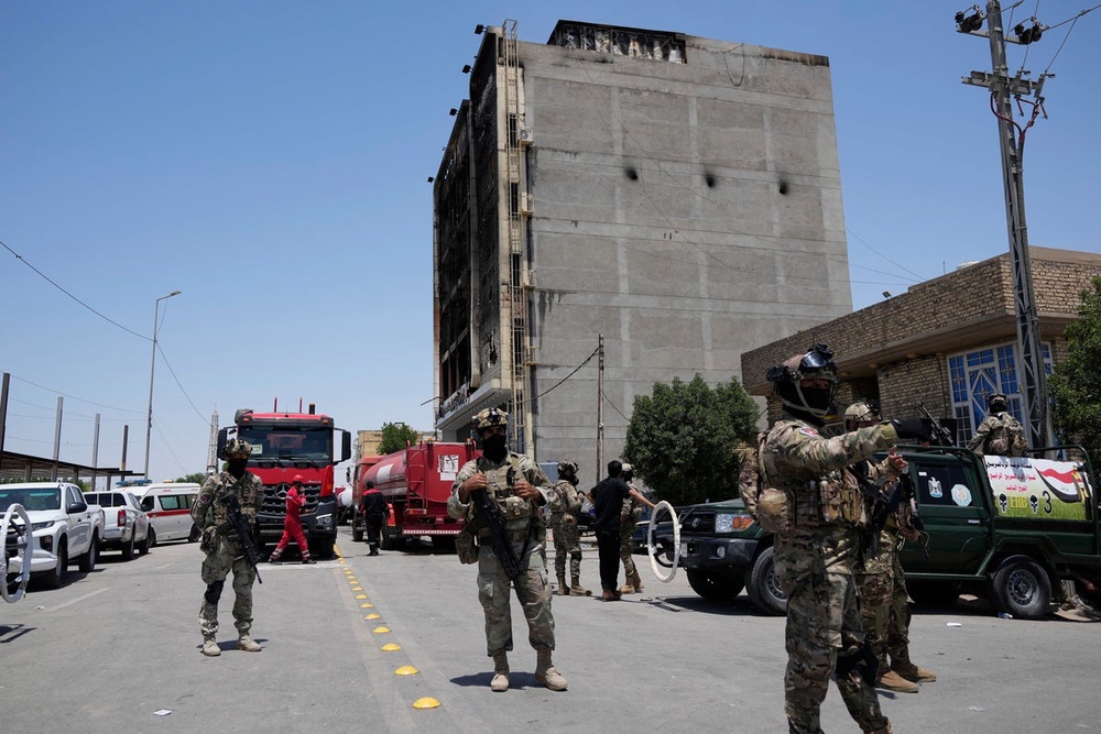 A fire at a mall in eastern Iraq kills more than 60 people