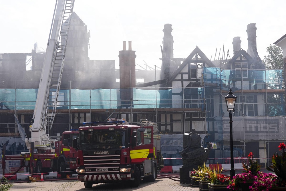 Two girls arrested after historic hotel destroyed in suspected arson attack