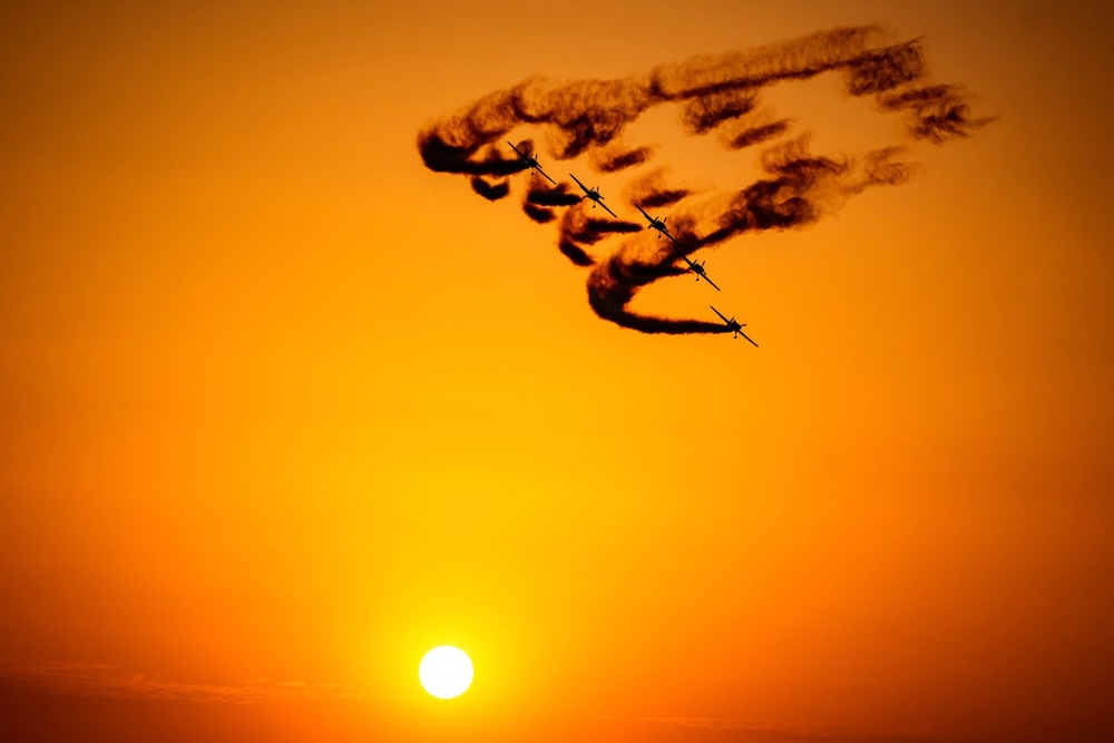 Photos of a display of aerobatics and military air power at the ...