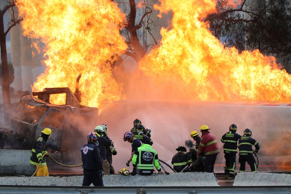 CCTV captures moment gas tanker overturns, sparking deadly explosion on ...
