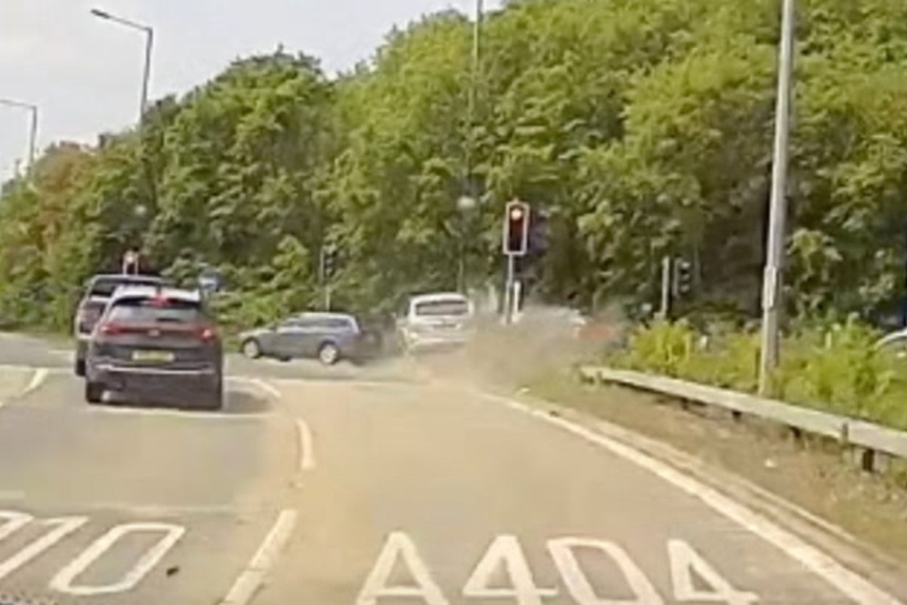 Dangerous driver smashes into car at roundabout during high speed chase