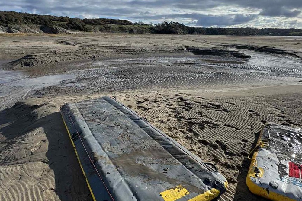 Man with just ‘chest, head and one arm’ poking out from quicksand ...