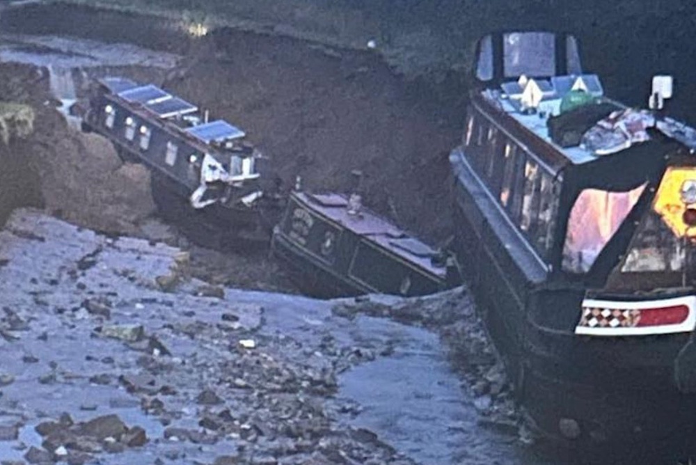 More than 10 rescued after huge sinkhole opens in canal in ‘major incident’