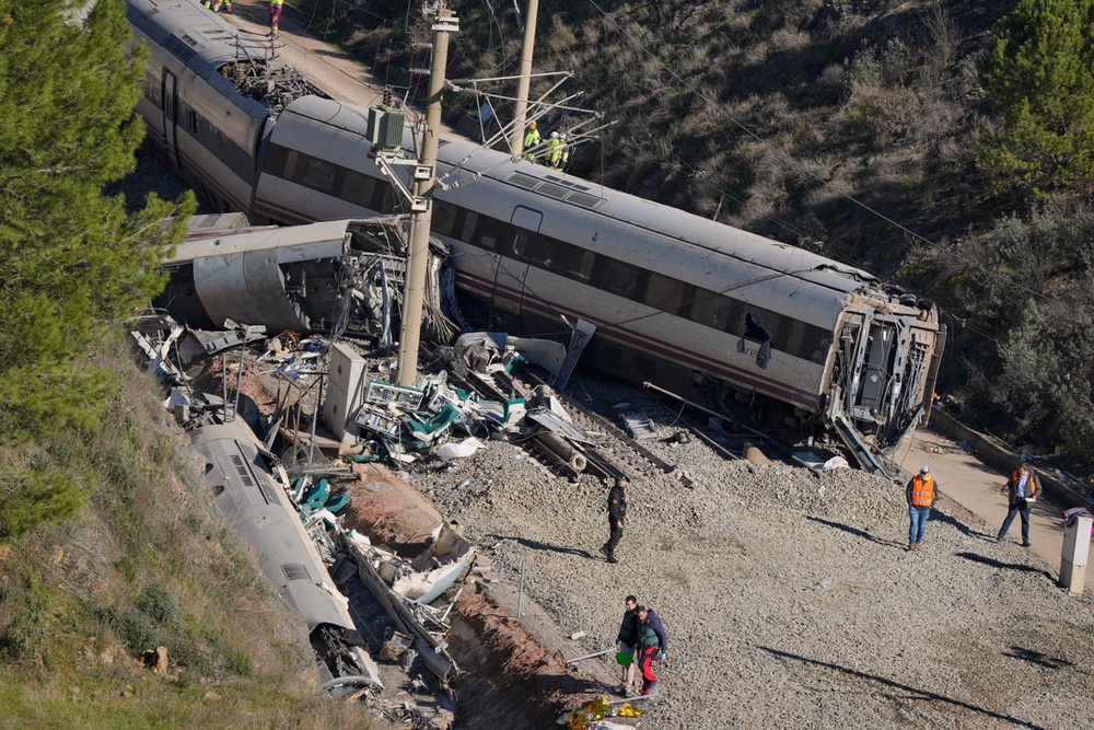 Spain train crash investigators hunt for remaining bodies in wreckage ...