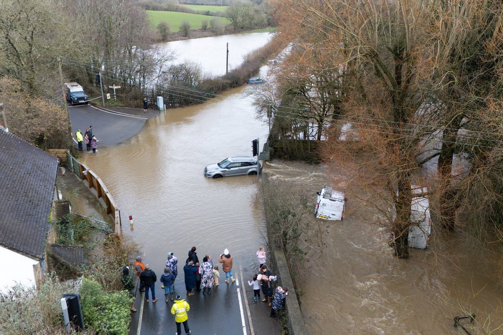 Storm Chandra floods latest: Flooded caravan park evacuated as travel ...