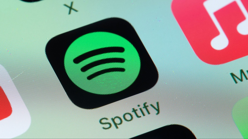 Apple approves Spotify app update that allows US users to access ...