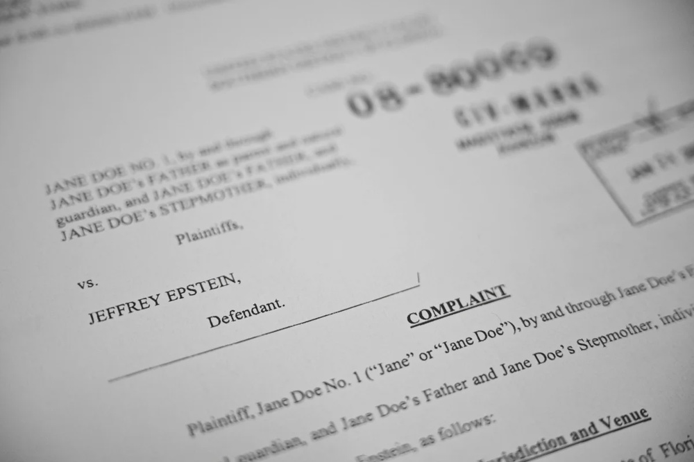 First batch of heavily redacted Epstein documents released by US ...