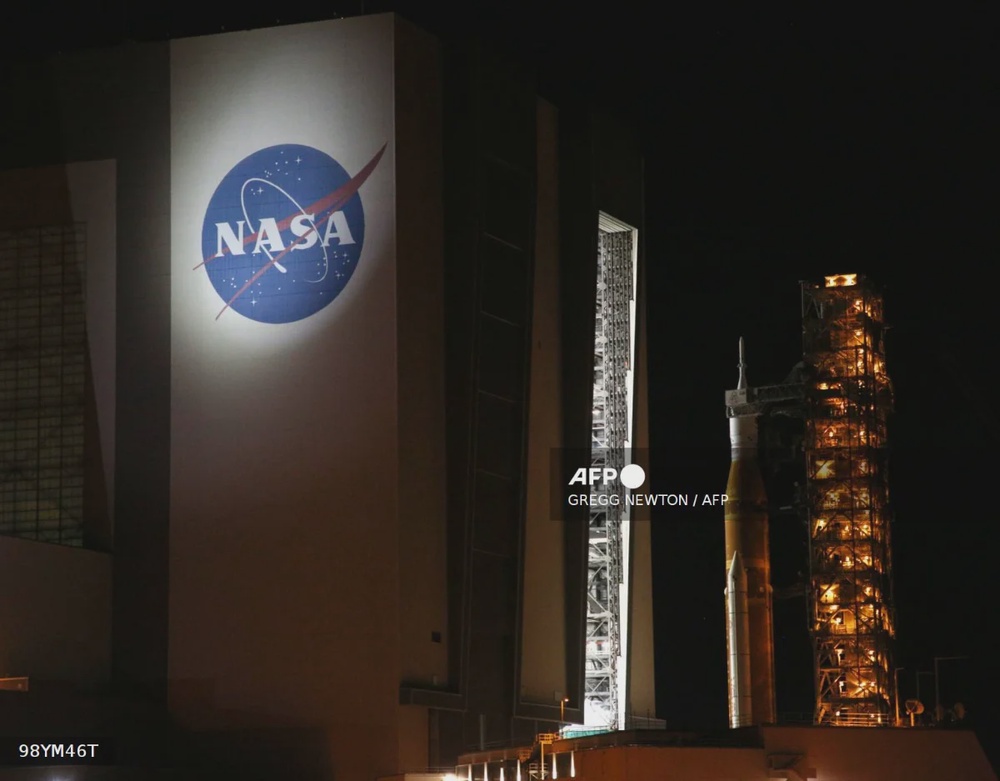 NASA rolls Moon rocket off launchpad for repairs