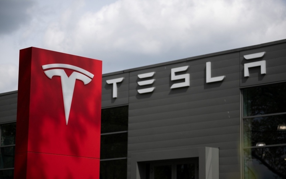 Tesla says it started building initial versions of an affordable car ...