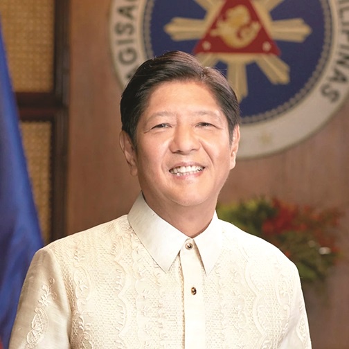 Marcos returns home after weeklong US, UK trips
