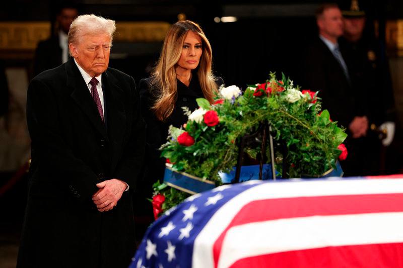Trump pays respects to late US president Jimmy Carter