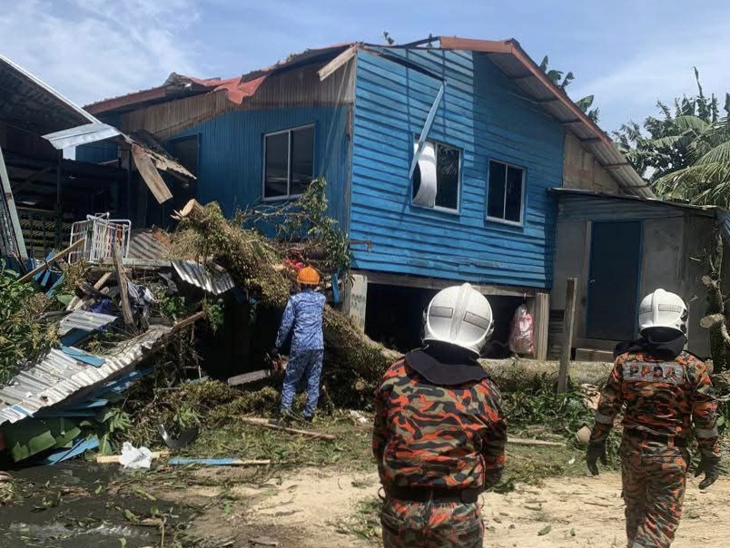 House hit by tree while family attends convocation