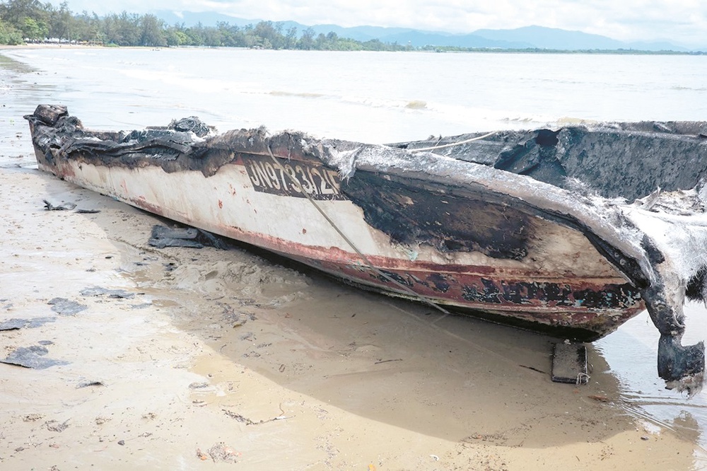 Lifeguard saves duo from burning boat