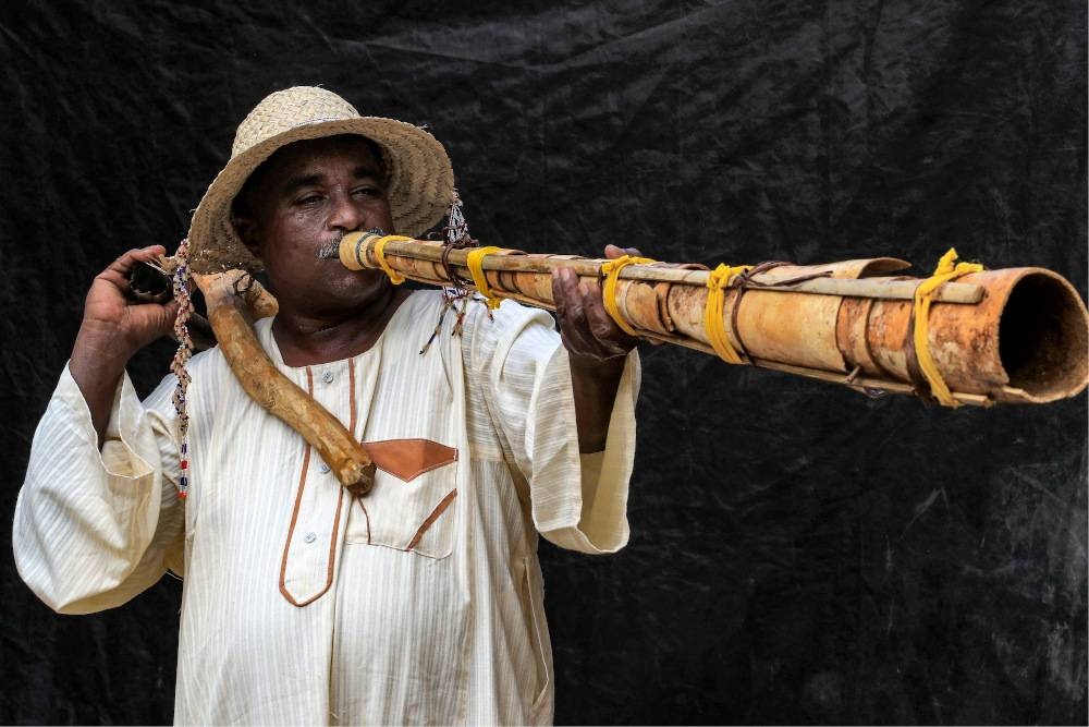 Sudan traditional wind instrument trumpets harvest time