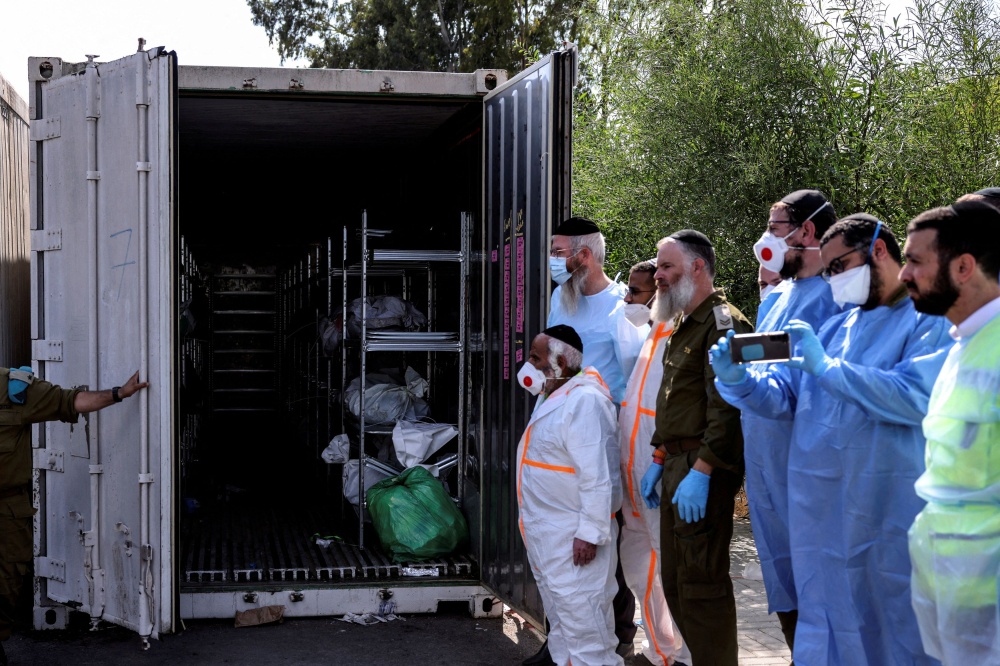 Israeli forensic teams describe signs of torture, abuse after examining ...