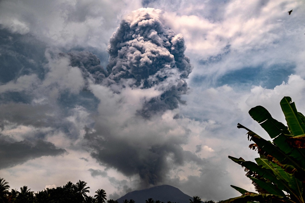 Indonesia’s Mount Ibu volcano erupts three times, spews 5km ash tower