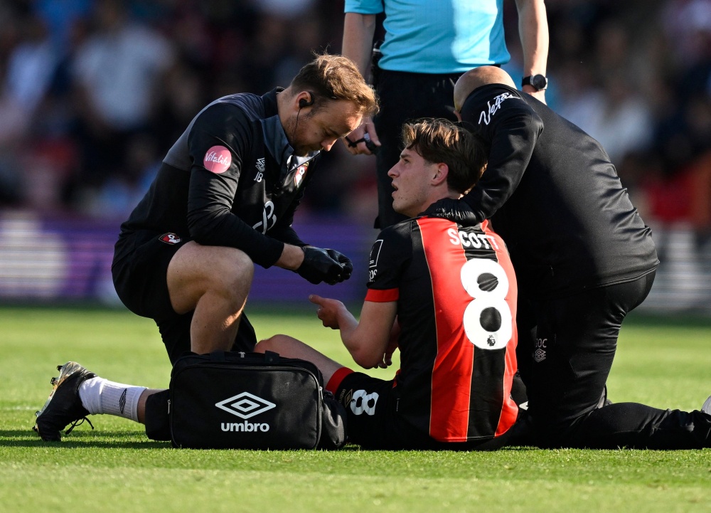 Bournemouth’s Alex Scott to undergo surgery after playing on with ...