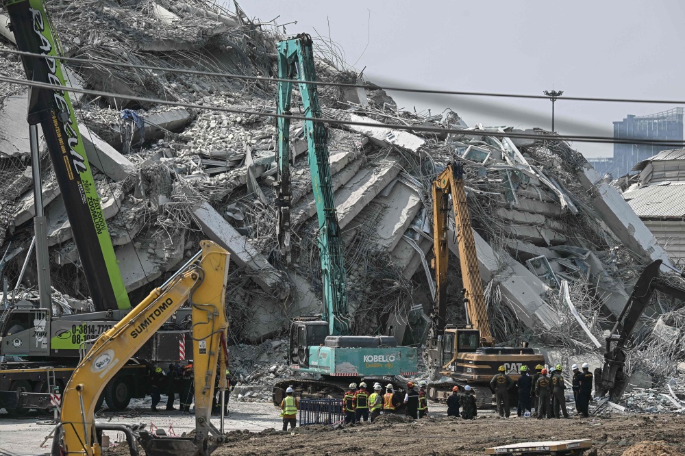 Thai construction tycoon and 14 others surrender to police over fatal ...