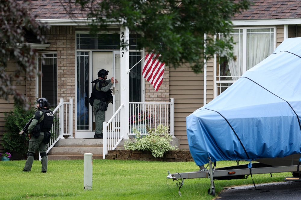 ‘Armed and dangerous’: Manhunt underway after gunman kills Minnesota ...