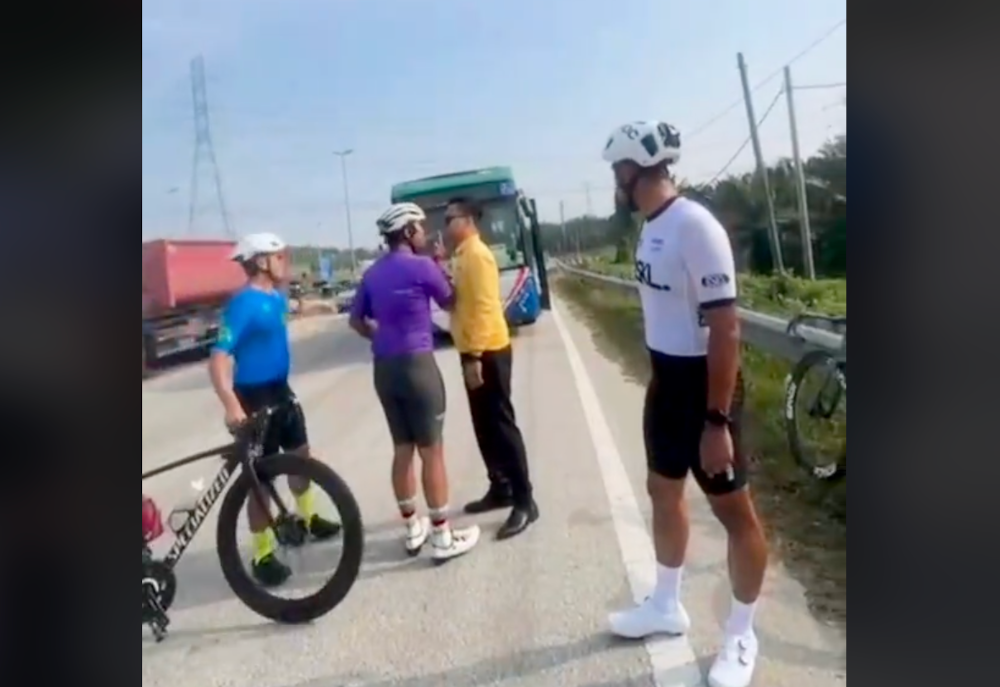 Police quiz cyclists, driver after clash over blocked bus lane on Kuala ...