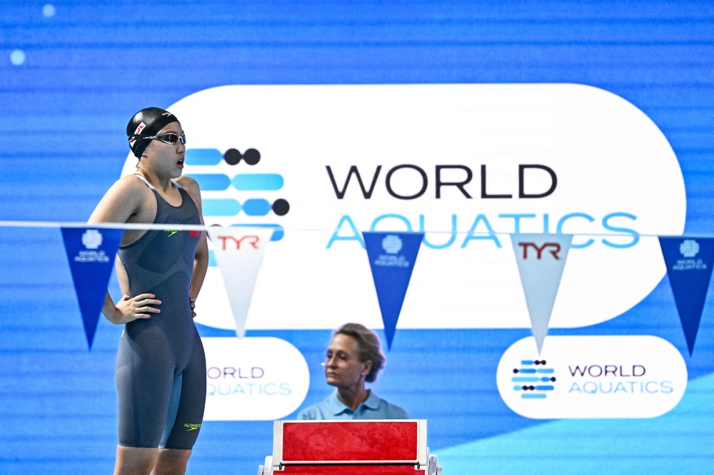 Yu Zidi makes the leap: 12‑year‑old seals world 200m medley final place ...