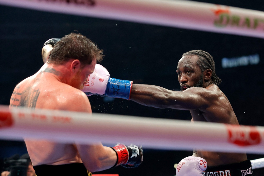 Undefeated Crawford shocks Canelo to become first ever three-weight ...