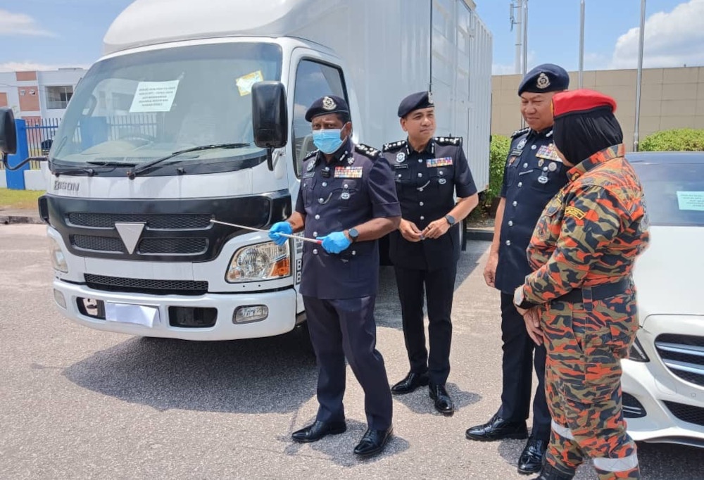 Johor factory fire uncovers RM17.7m international drug lab churning out ...