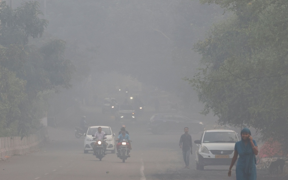 New Delhi choked by smog 16 times above WHO limit as pollution surges ...