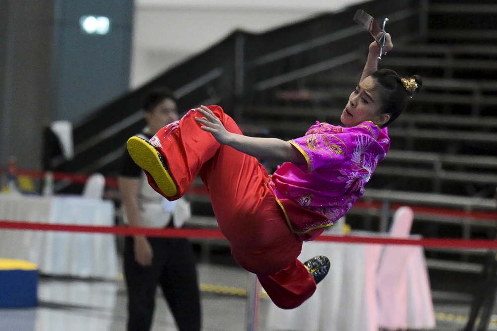 Golden finish: Tan Cheong Min leads Malaysia’s wushu team to SEA Games ...