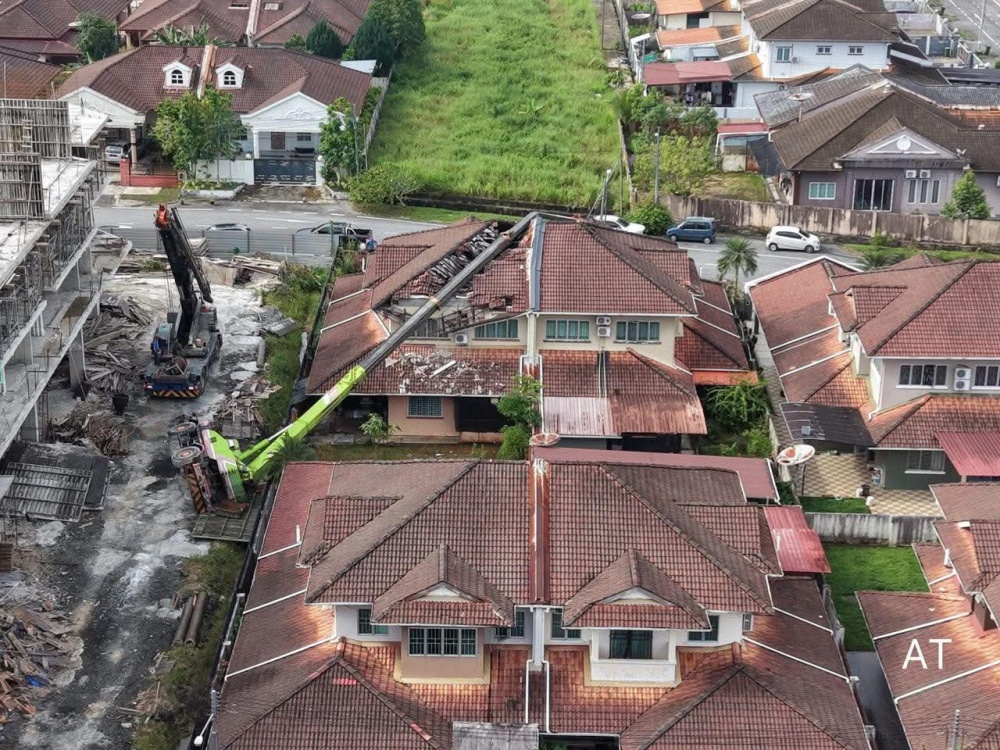 DOSH shuts down Stutong Baru construction site after crane topples into ...