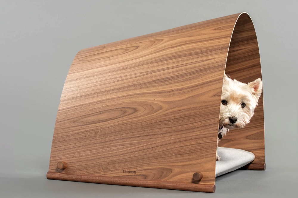 This flat-pack dog kennel is the comfortable + cozy home your doggo needs