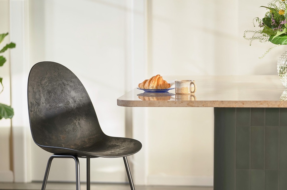 This contemporary high stool is built from coffee shells and e-waste