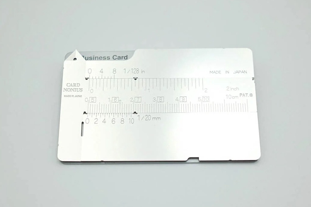 This tiny wallet-sized card clipper EDC accurately measures objects ...
