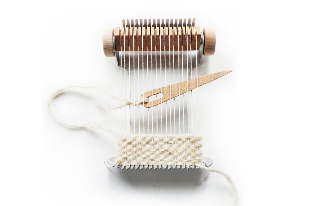 Portable loom lets you weave and carry your craft wherever you are