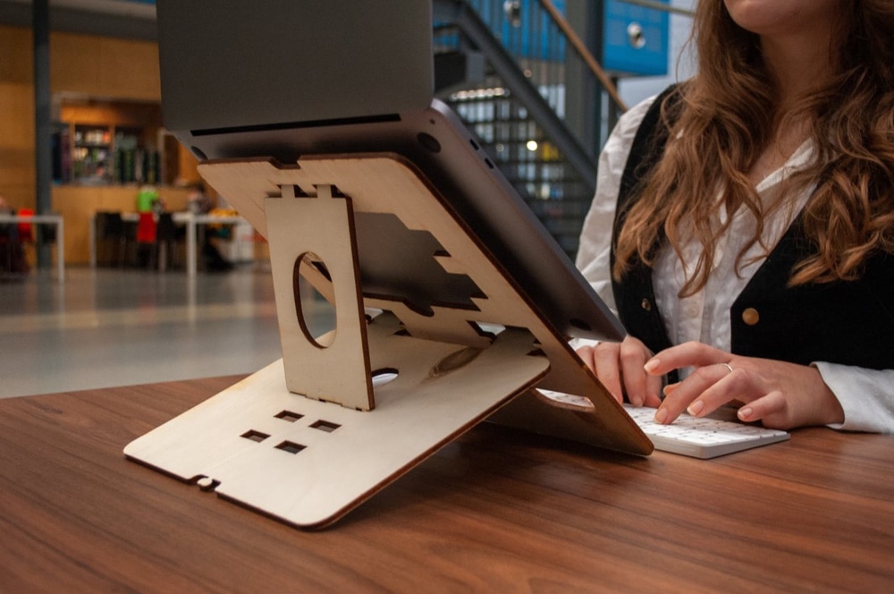 Ergonomic wooden laptop stand is portable, sustainable