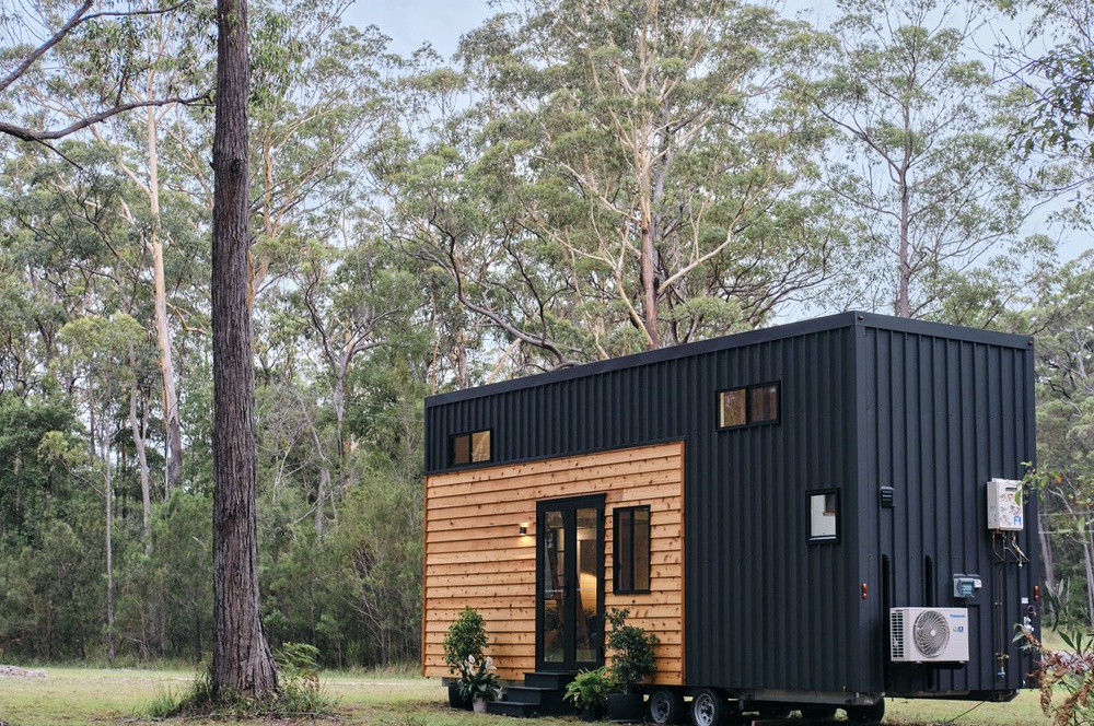Cedar-Clad Tiny Home Expands With A Slide-Out Section & Supports A ...
