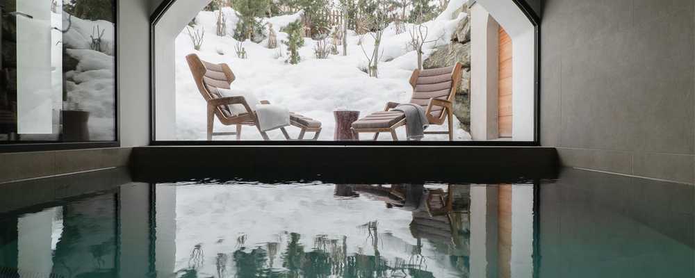 Step into a winter wonderland at this snow-covered St Moritz chalet