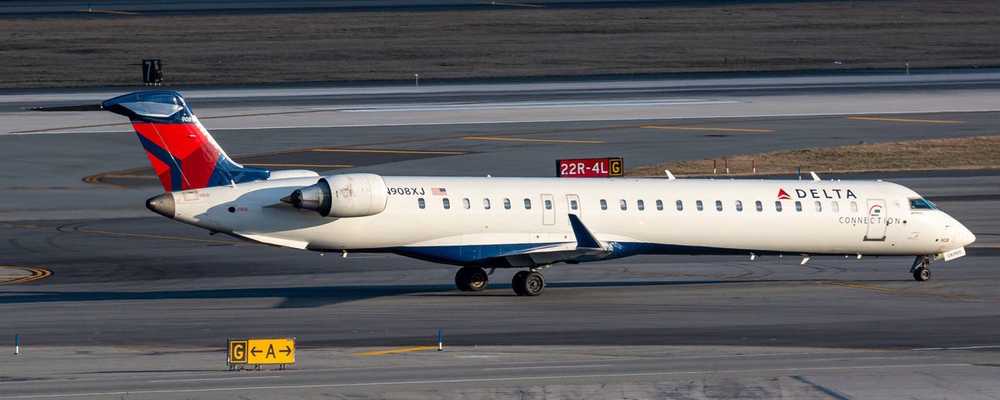 Delta plane slides off icy runway shutting major airport over ...