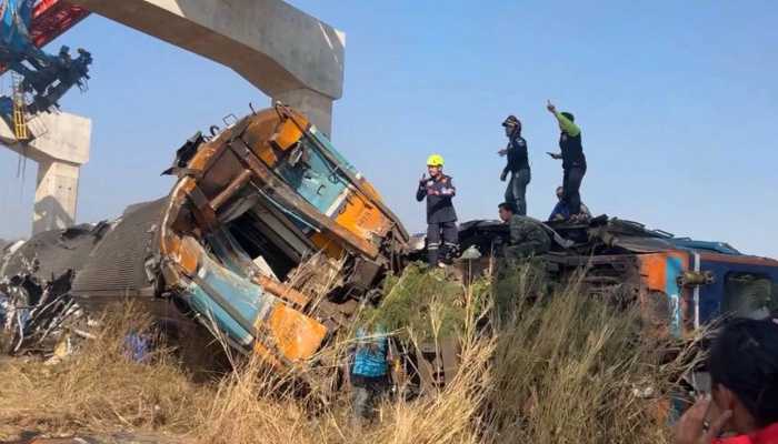 Moving train collides with collapsed crane in Korat, 22 killed