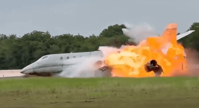 Two dead after private jet erupts into massive fireb a ll skidding ...