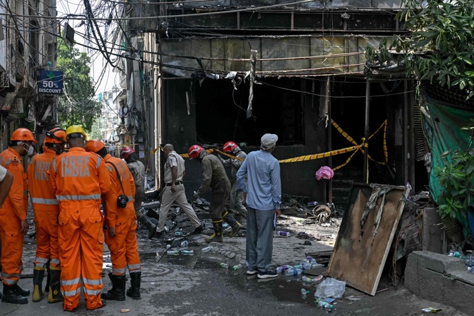 India detains hotel owner as probe begins into fire that left 21 dead ...